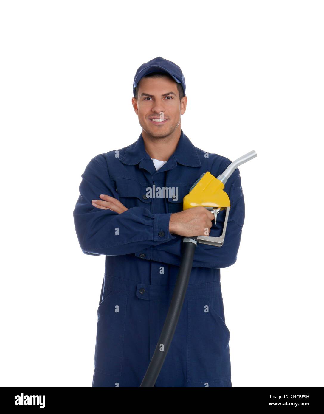 Gas station worker with fuel nozzle on white background Stock Photo - Alamy