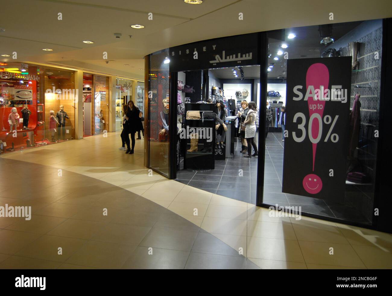 In this photo taken Thursday, Jan. 13, 2011, people walk through the ...