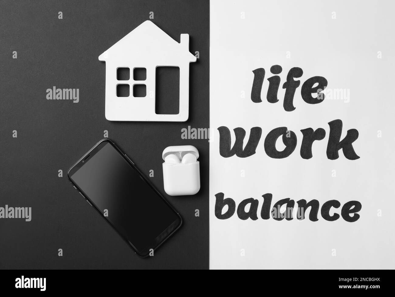 Wooden house, wireless earphones and smartphone on color background ...