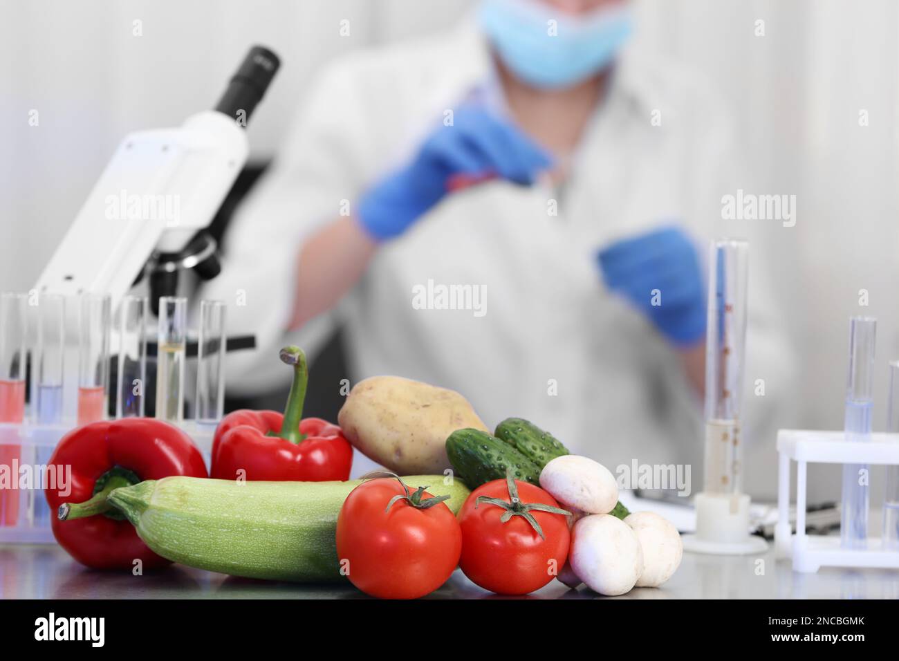 Fresh vegetables on table in laboratory. Food quality control Stock ...
