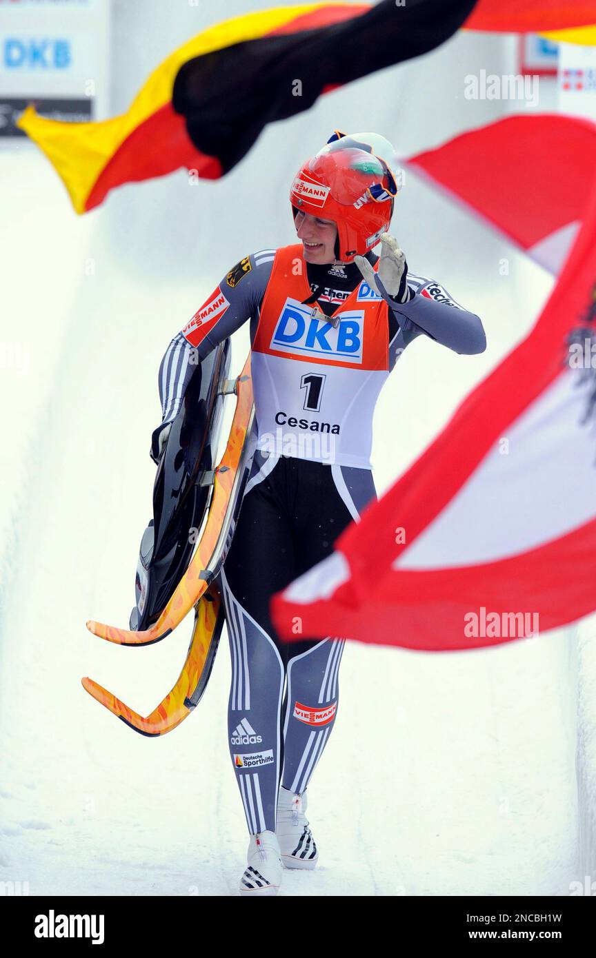 Germany's Tatjana Hufner celebrates in the finish area after winning ...