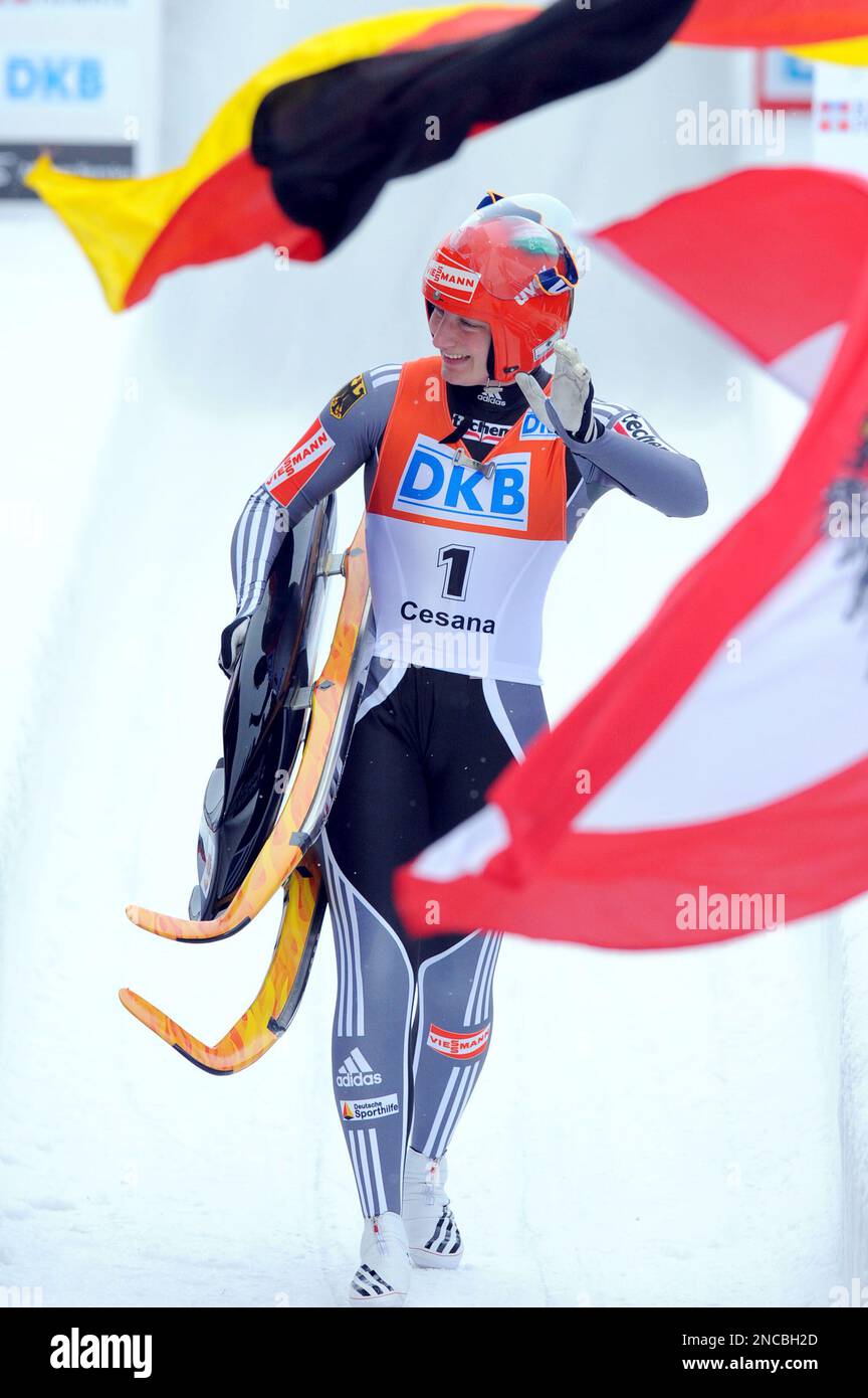 Germany's Tatjana Hufner celebrates in the finish area after winning ...