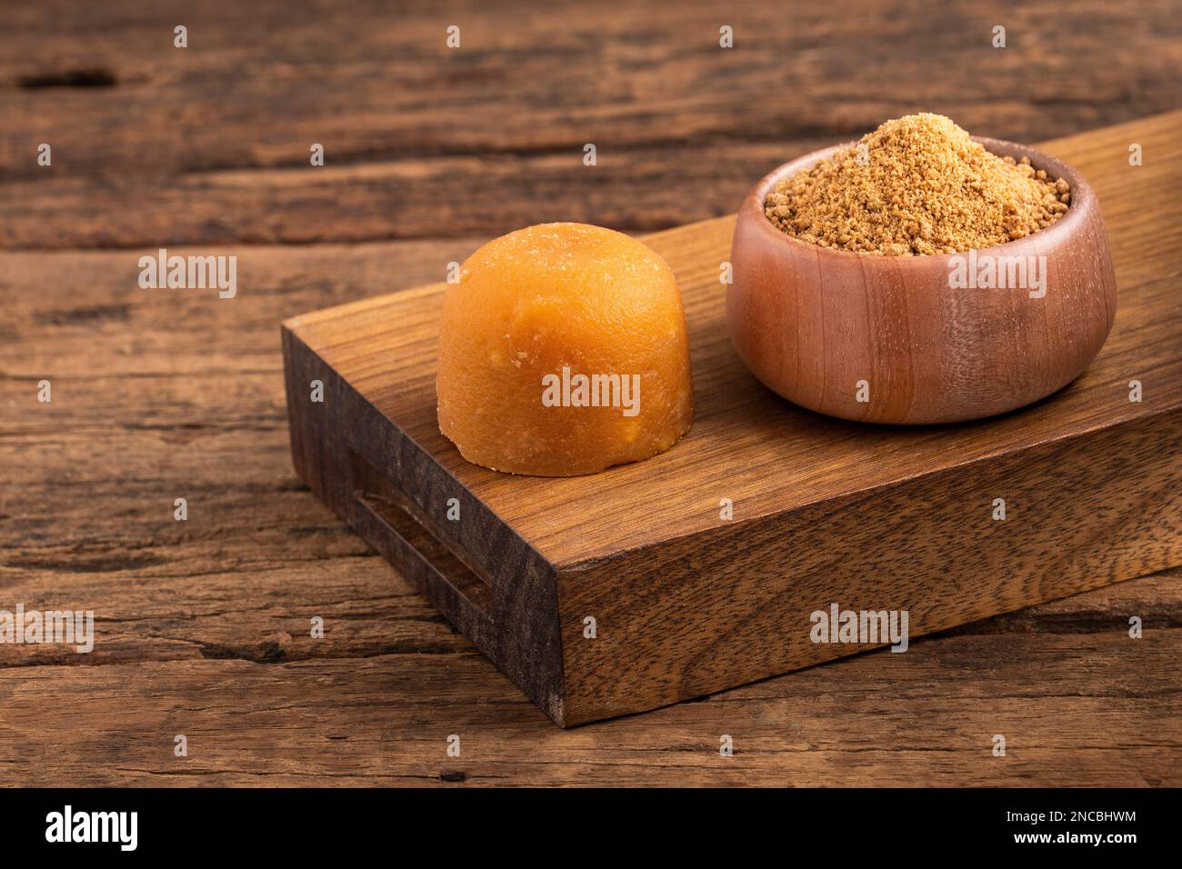 Saccharum officinarum - Blocks and powder of sugarcane panela Stock ...