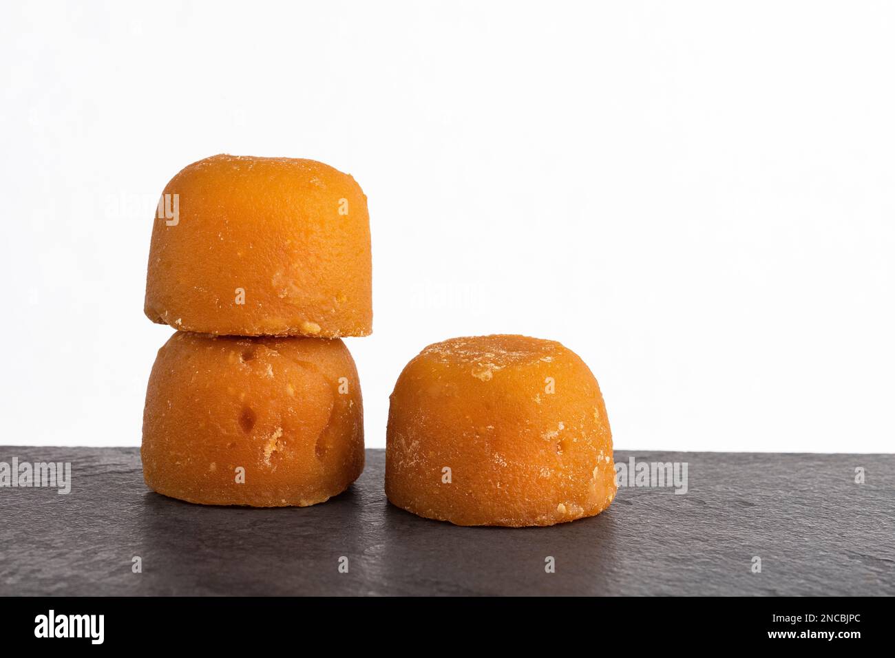 Saccharum officinarum - Panela or sugar cane candy Stock Photo - Alamy