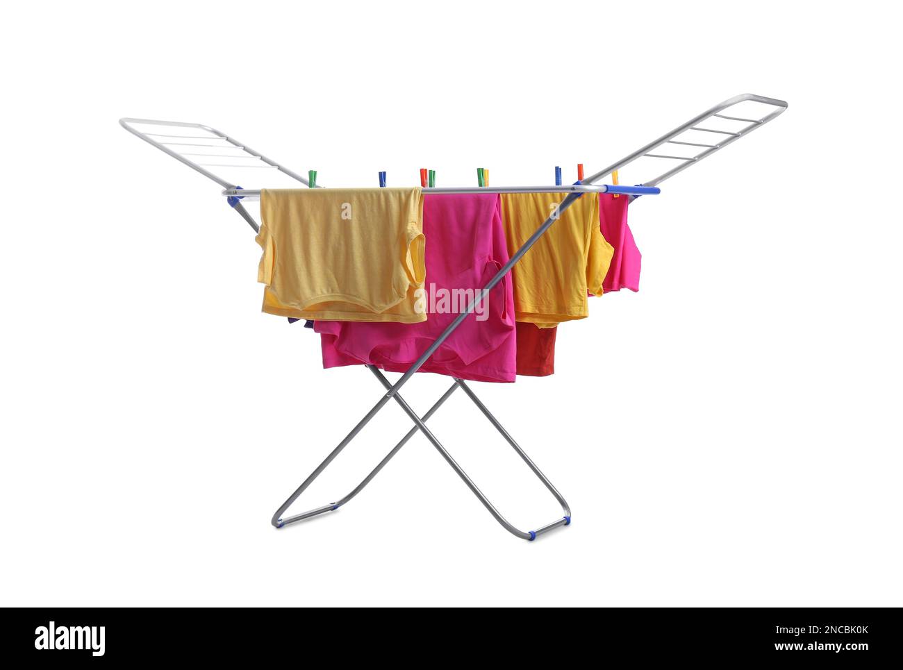 Clean laundry hanging on drying rack against white background Stock ...