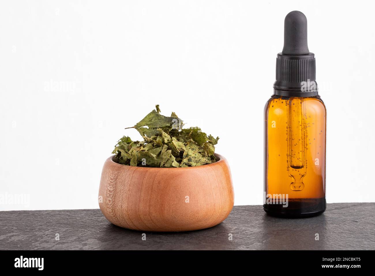 Organic nettle plant extract - Urtica Medicinal Stock Photo - Alamy