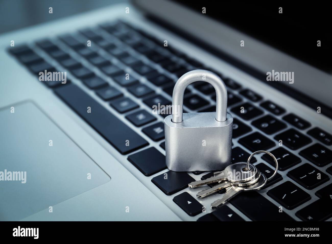 Metal lock and keys on laptop, closeup. Cyber security concept Stock ...