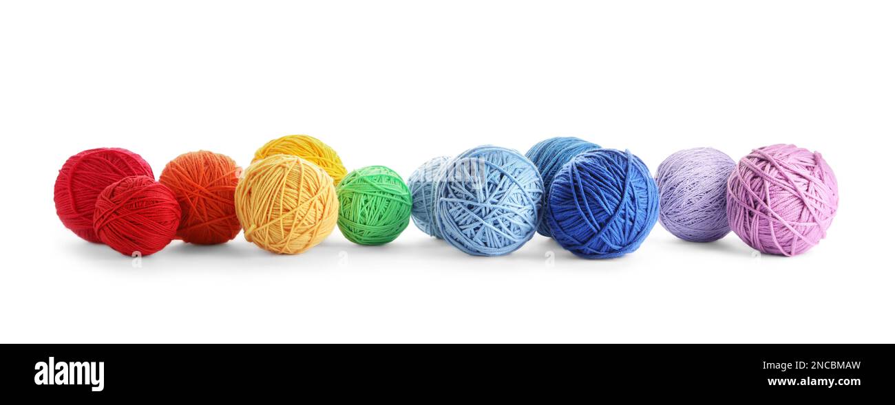 Soft colorful woolen yarns on white background Stock Photo - Alamy