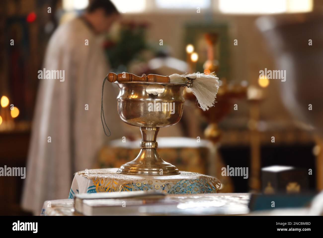 Aspergillum holy water sprinkler hi-res stock photography and images ...