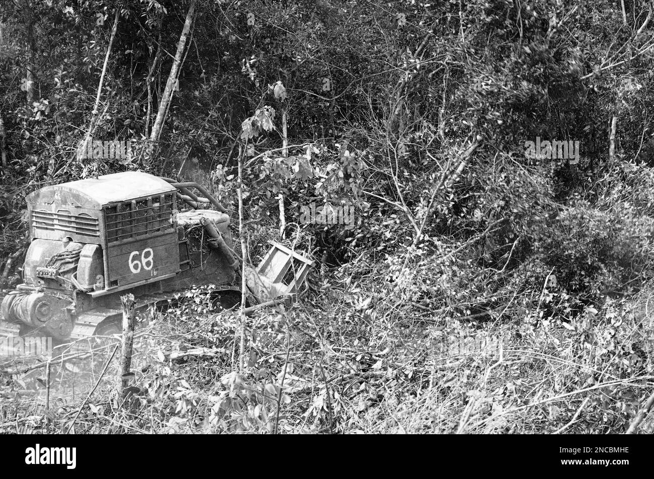 An armored bulldozer manned by men of the U.S. 501st engineer company ...