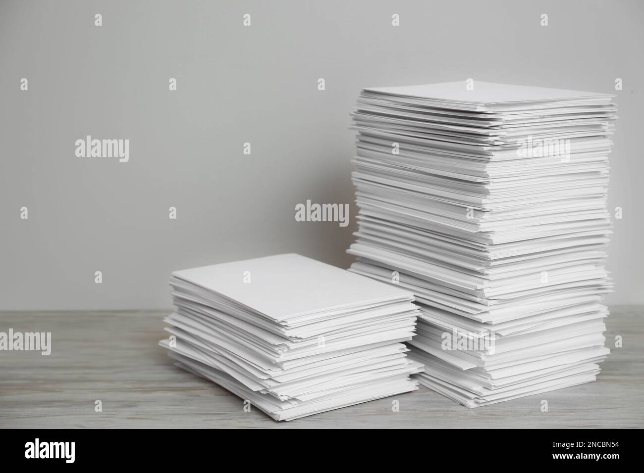 Stacks of paper on office desk hi-res stock photography and images - Alamy