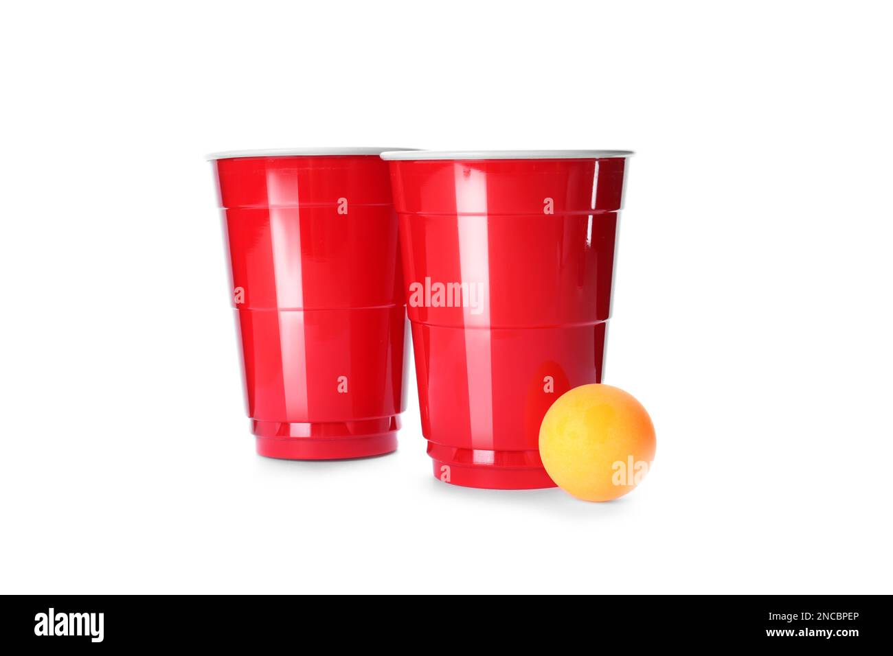 Red plastic cups and ball for beer pong on white background Stock Photo ...