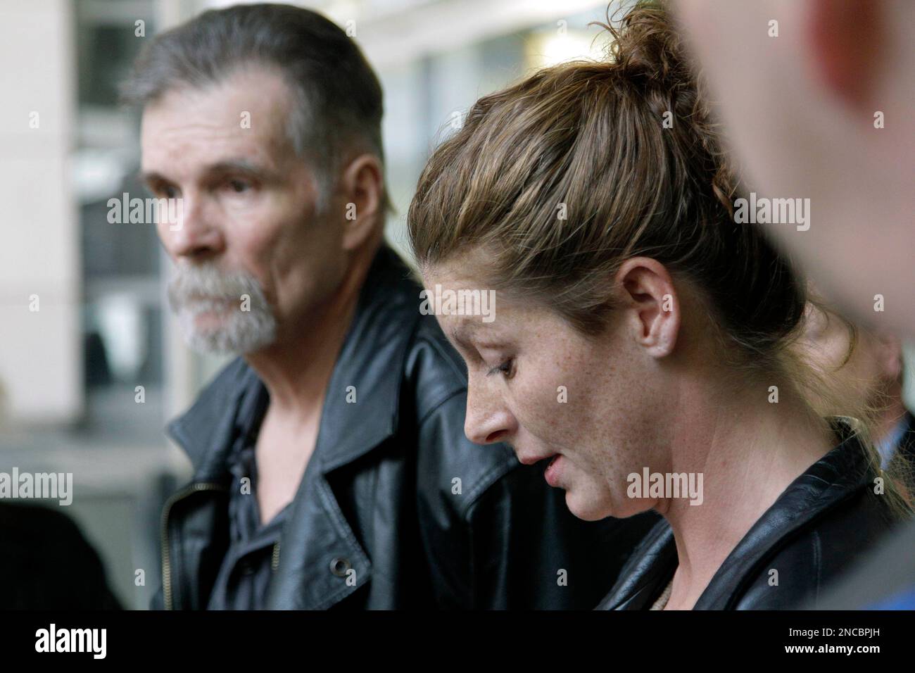 Amy Evers and her father Bob Evers, family of Jason Robert Evers, speak with reporters following ...