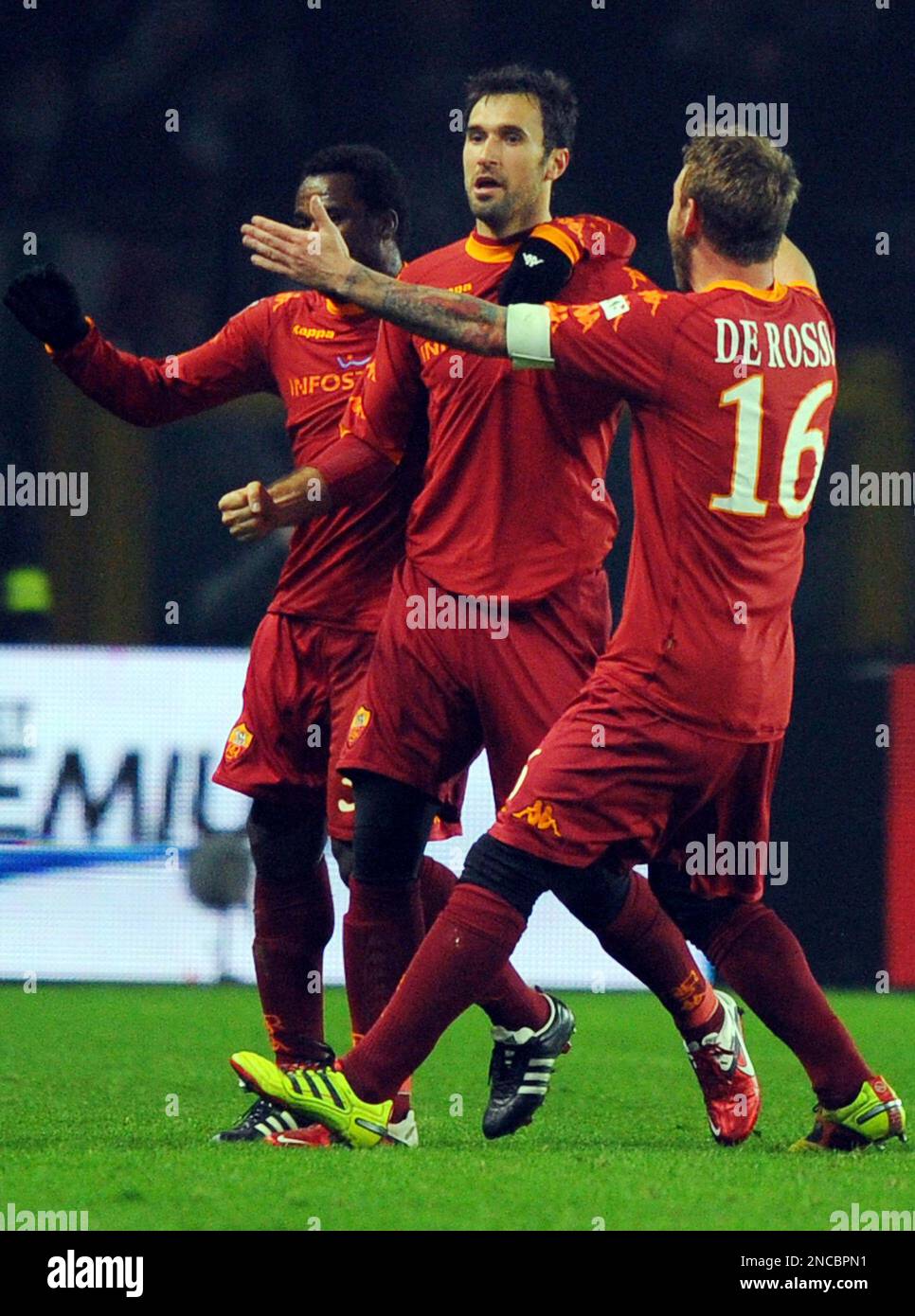 AS Roma's Mirko Vucinic cof Montenegro, center, celebrates with his ...