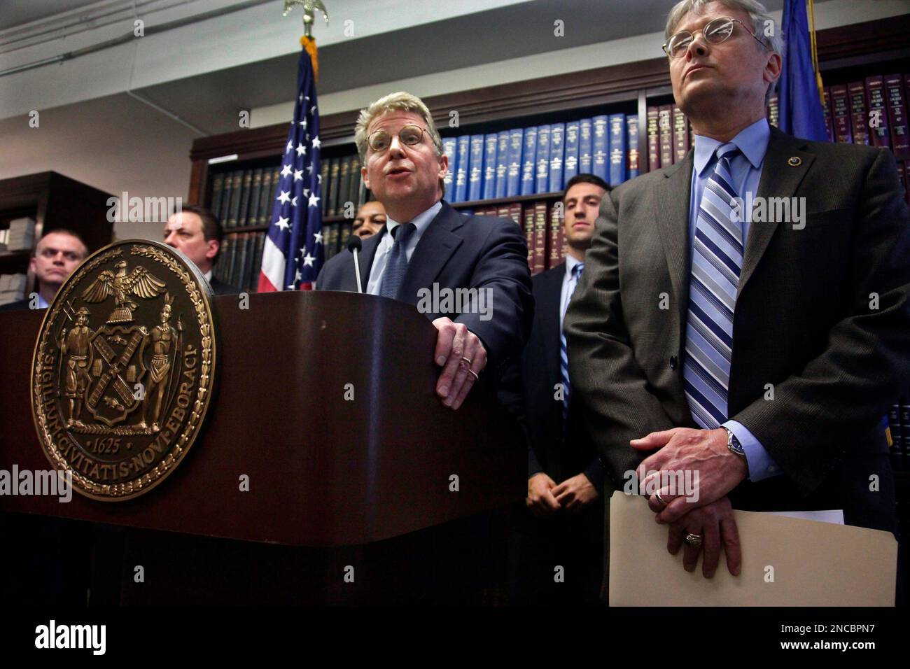 Manhattan District Attorney Cyrus Vance Jr., center, and law ...