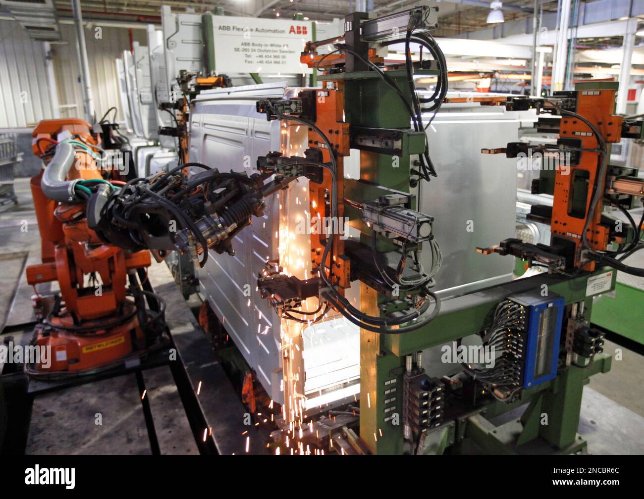 In this Jan. 26, 2011 photo, robots weld a chassis on the Volvo truck ...