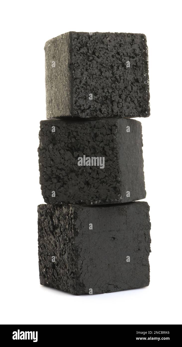 Stack of charcoal cubes for hookah on white background Stock Photo - Alamy