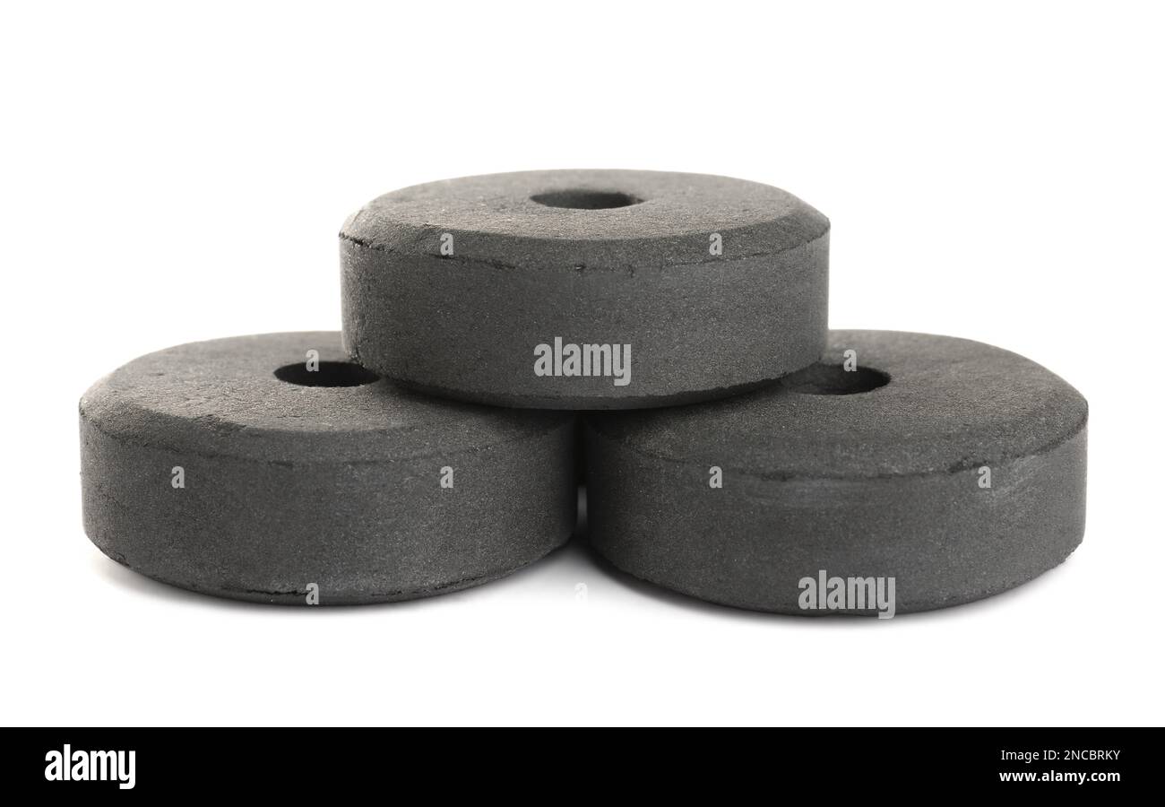 Charcoal rings for hookah on white background Stock Photo - Alamy