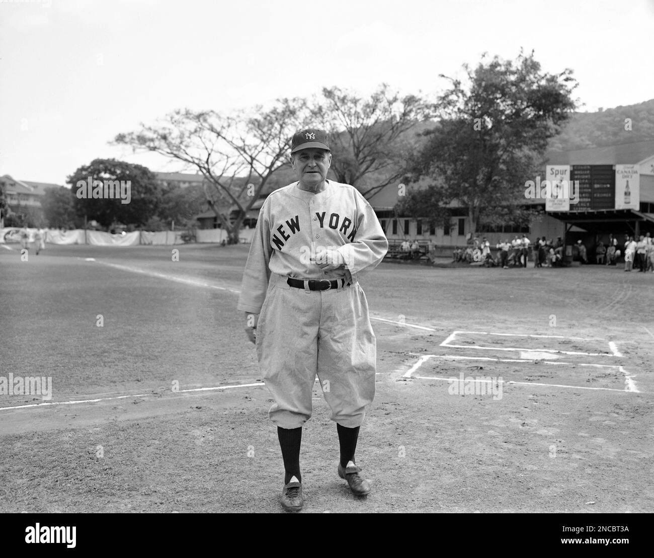 Joe McCarthy, Yankee pilot, stands at home plate in Balboa Stadium ...