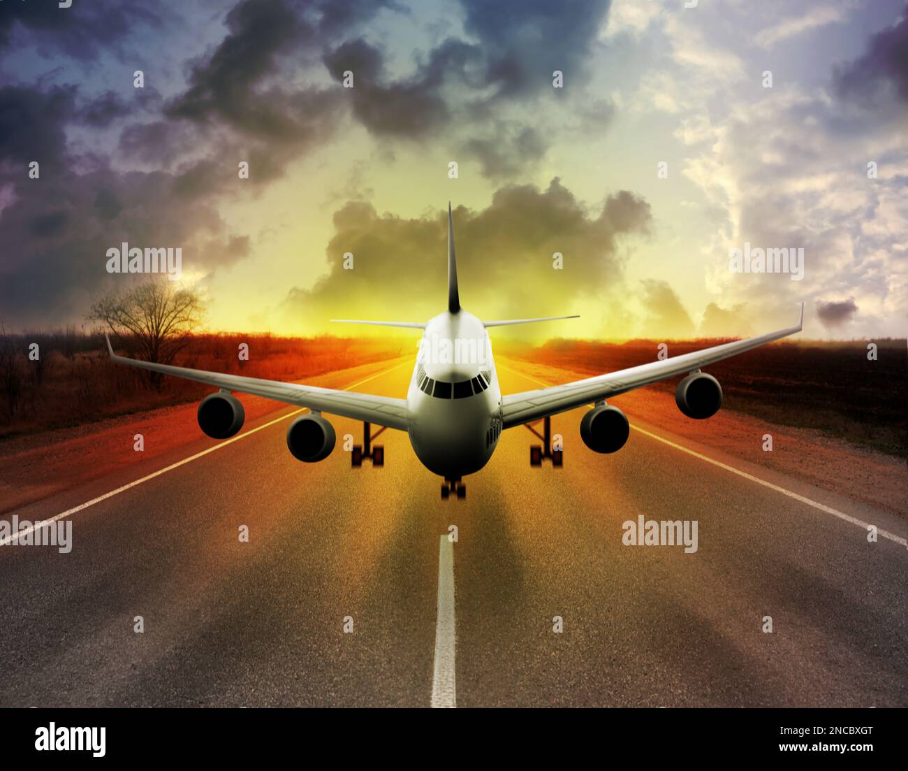 Modern white airplane landing on runway Stock Photo - Alamy