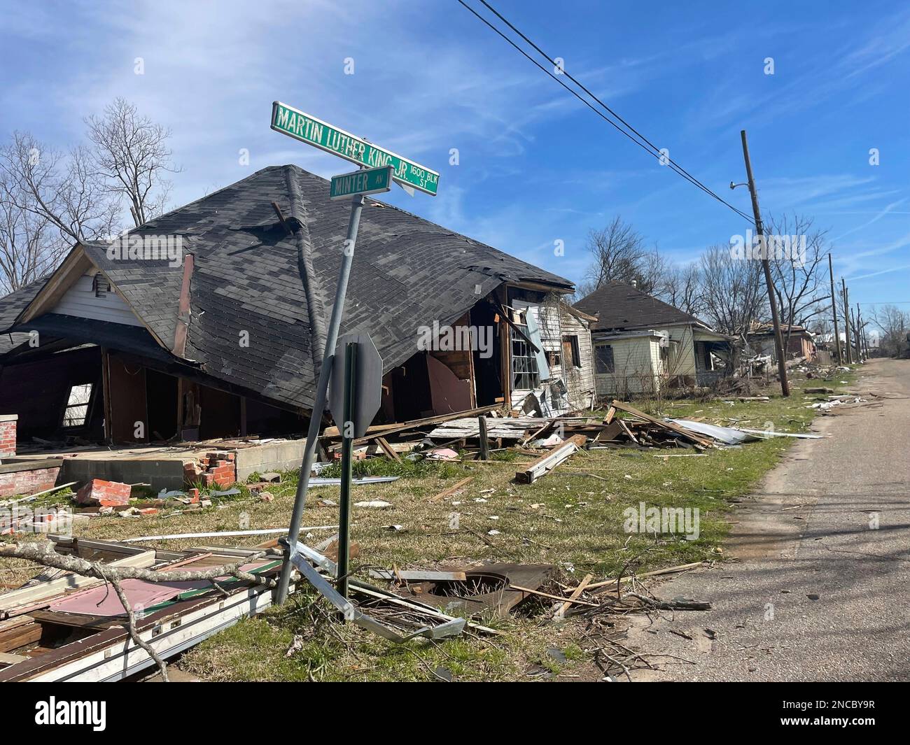 Debris litters the ground around homes heavily damaged by last month's ...