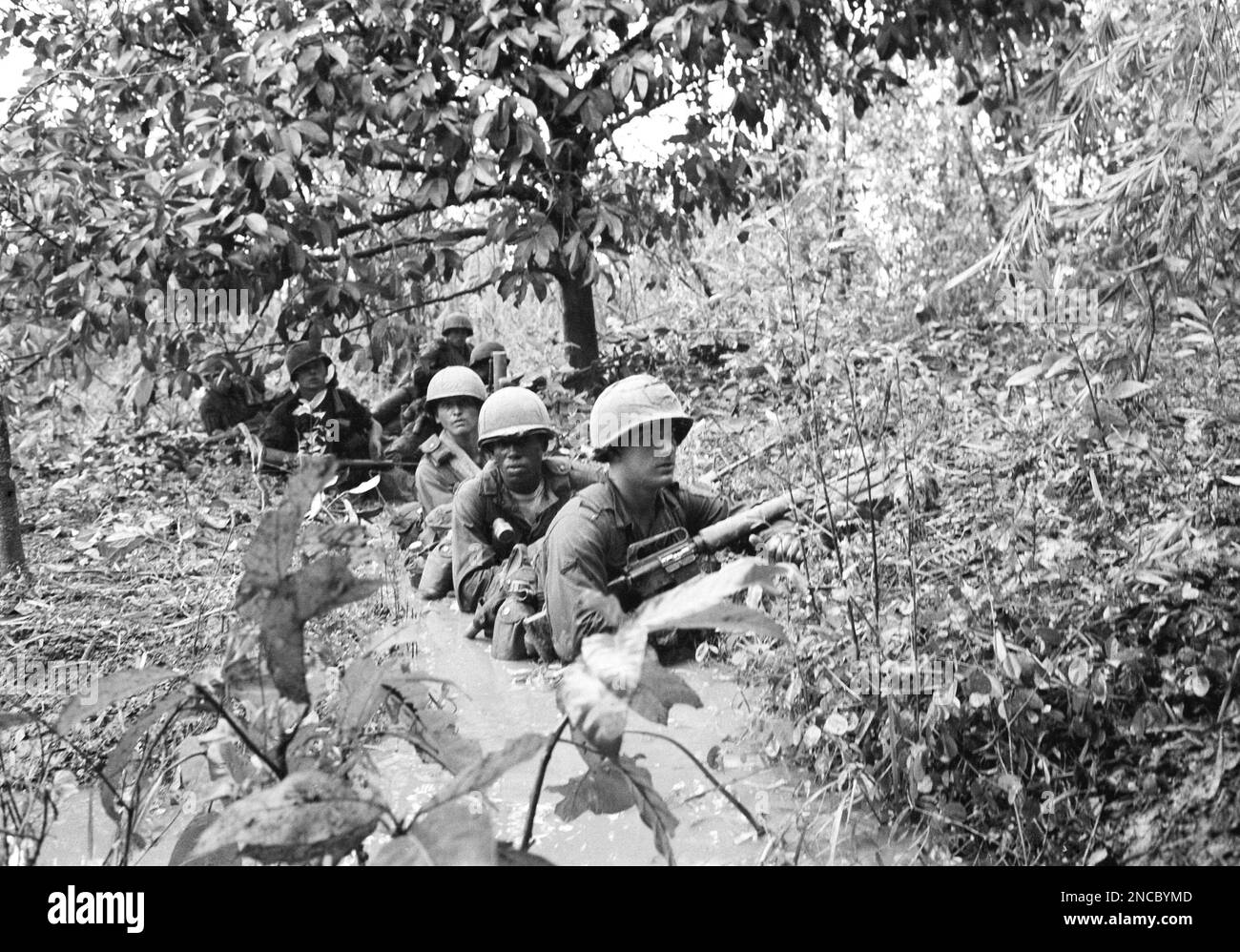 Army soldier weaponry looking away sitting holding military hi-res ...