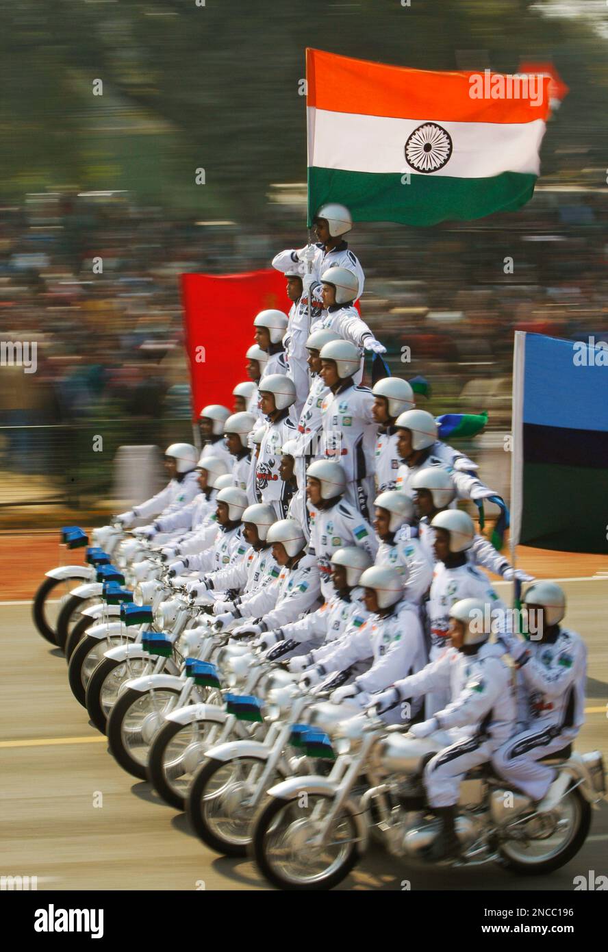 Indian army soldiers perform motorcycle stunts as they carry the Indian ...