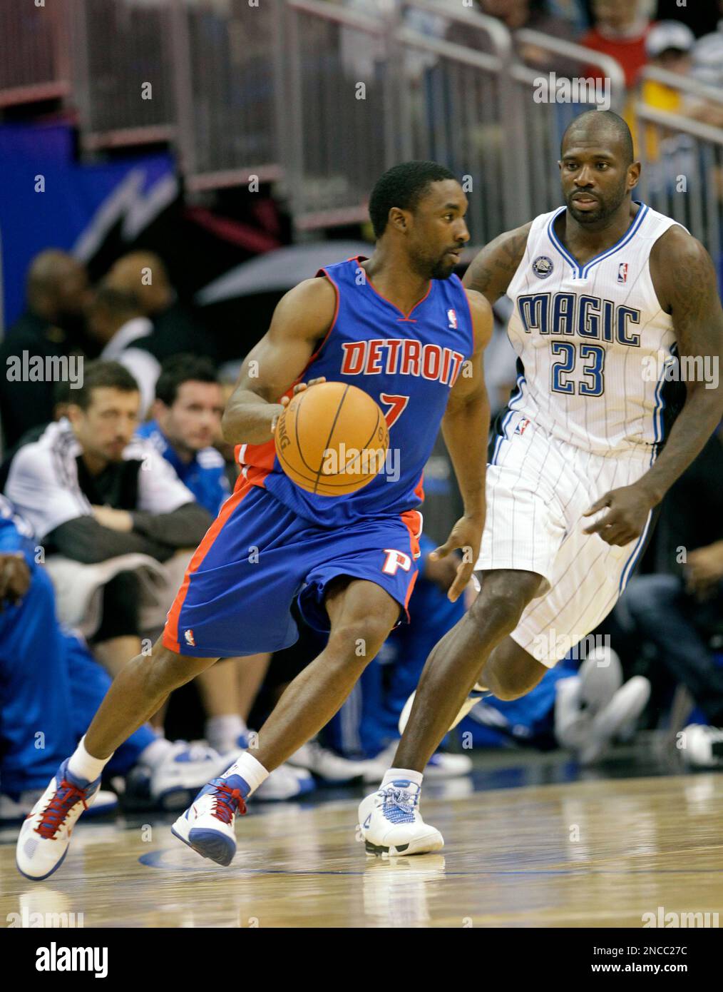 Detroit Pistons' Ben Gordon (7) drives around Orlando Magic's Jason ...