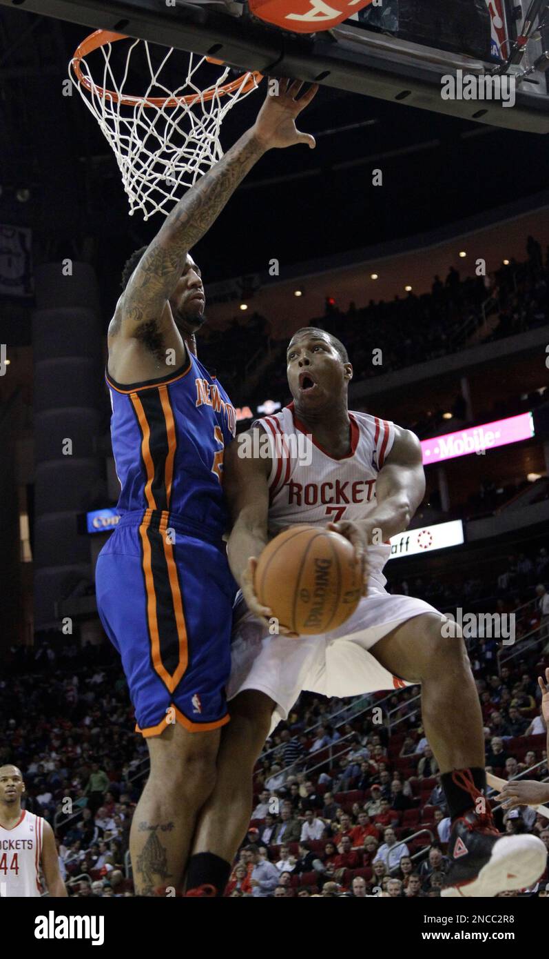 Houston Rockets' Kyle Lowry (7) shoots as New York Knicks' Wilson ...