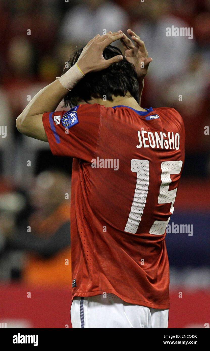 South Korea's Hong Jeong Ho reacts after missing a penalty shot during ...
