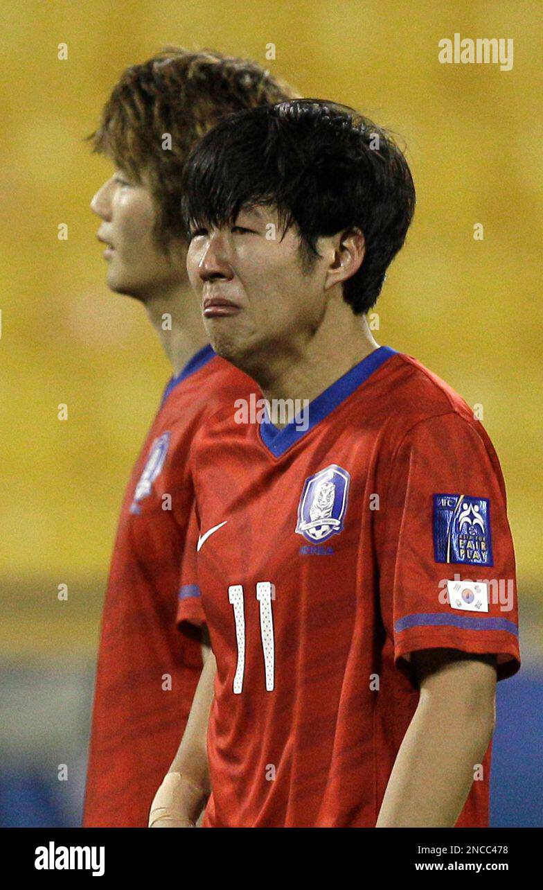 South Korea's player Son Heung Min, cries after his team lost the AFC ...