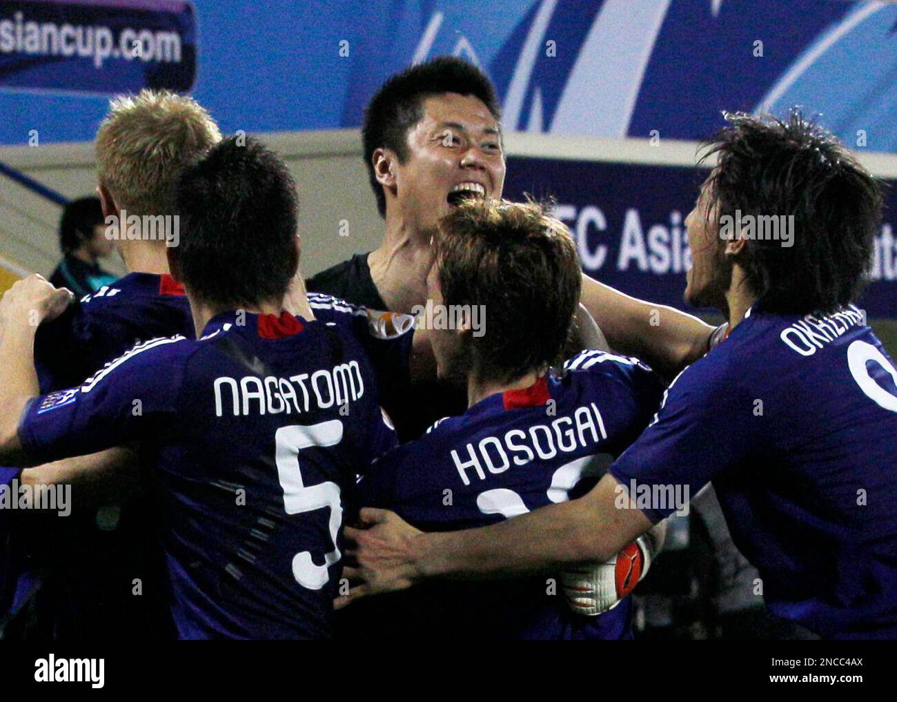 Japan team celebrates after winning the AFC Asian Cup Semi Final soccer ...