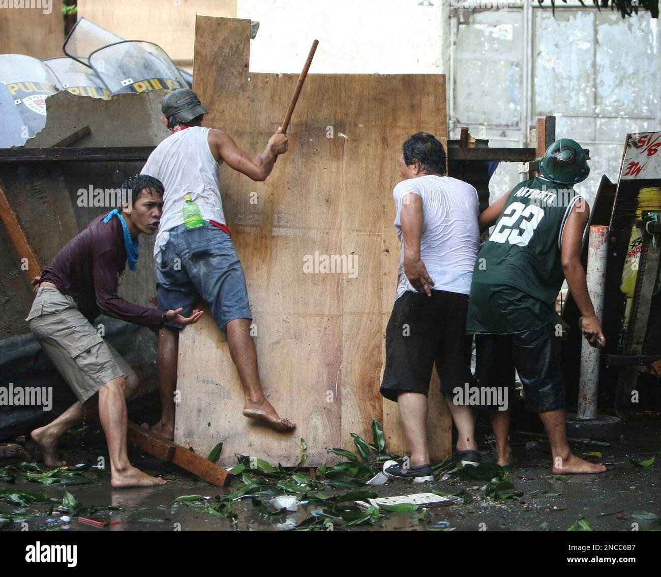 Residents from the squatters community of San Juan, east of Manila ...