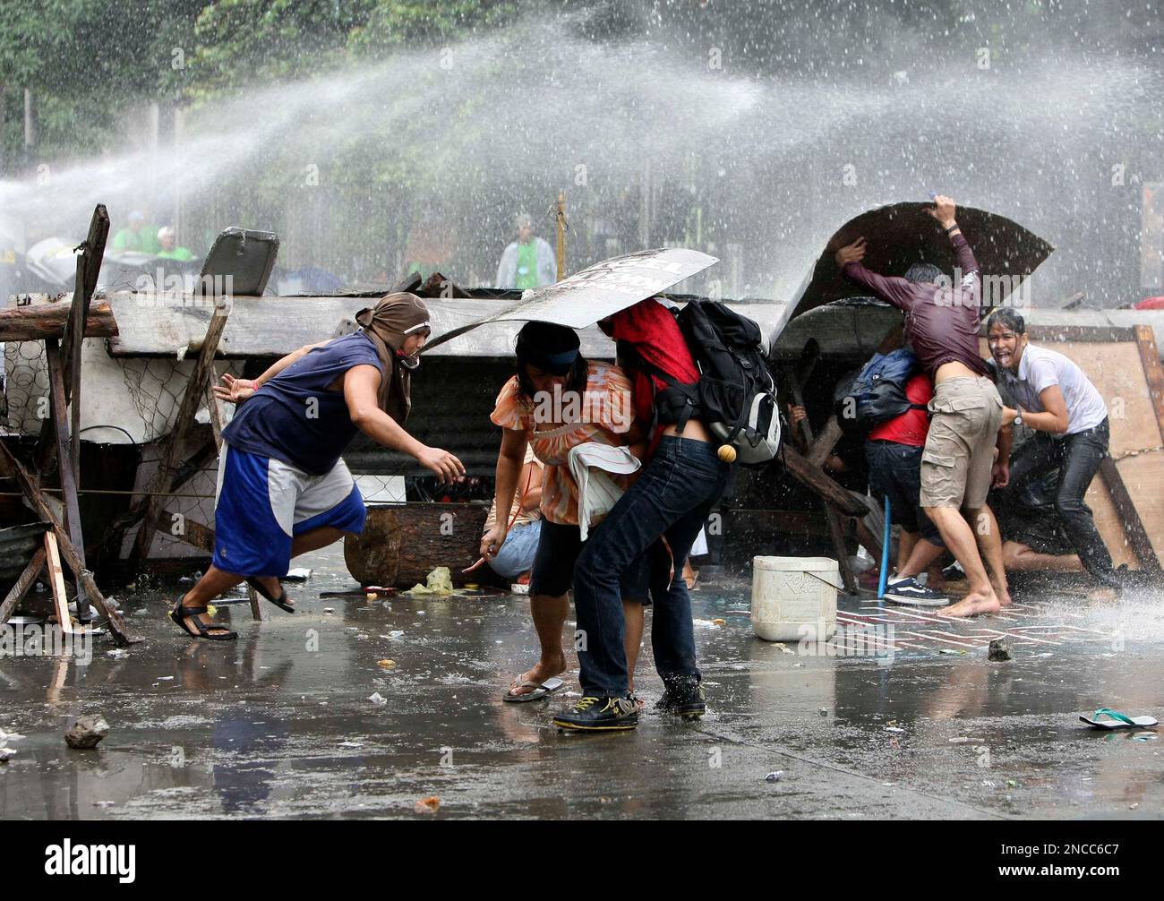 Residents from the squatters community of San Juan, east of Manila ...