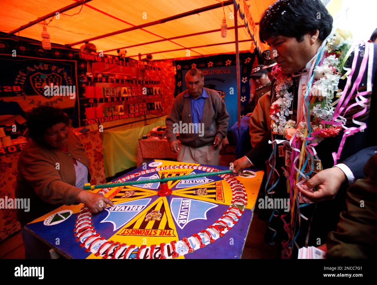 Bolivia's President Evo Morales, right, plays a traditional local ...