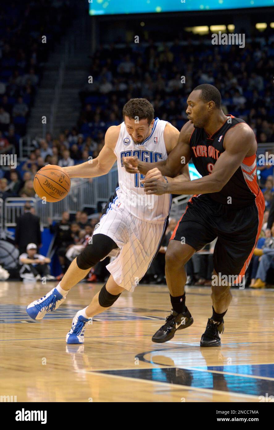 Orlando Magic forward Hedo Turkoglu, left, of Turkey, drives past ...