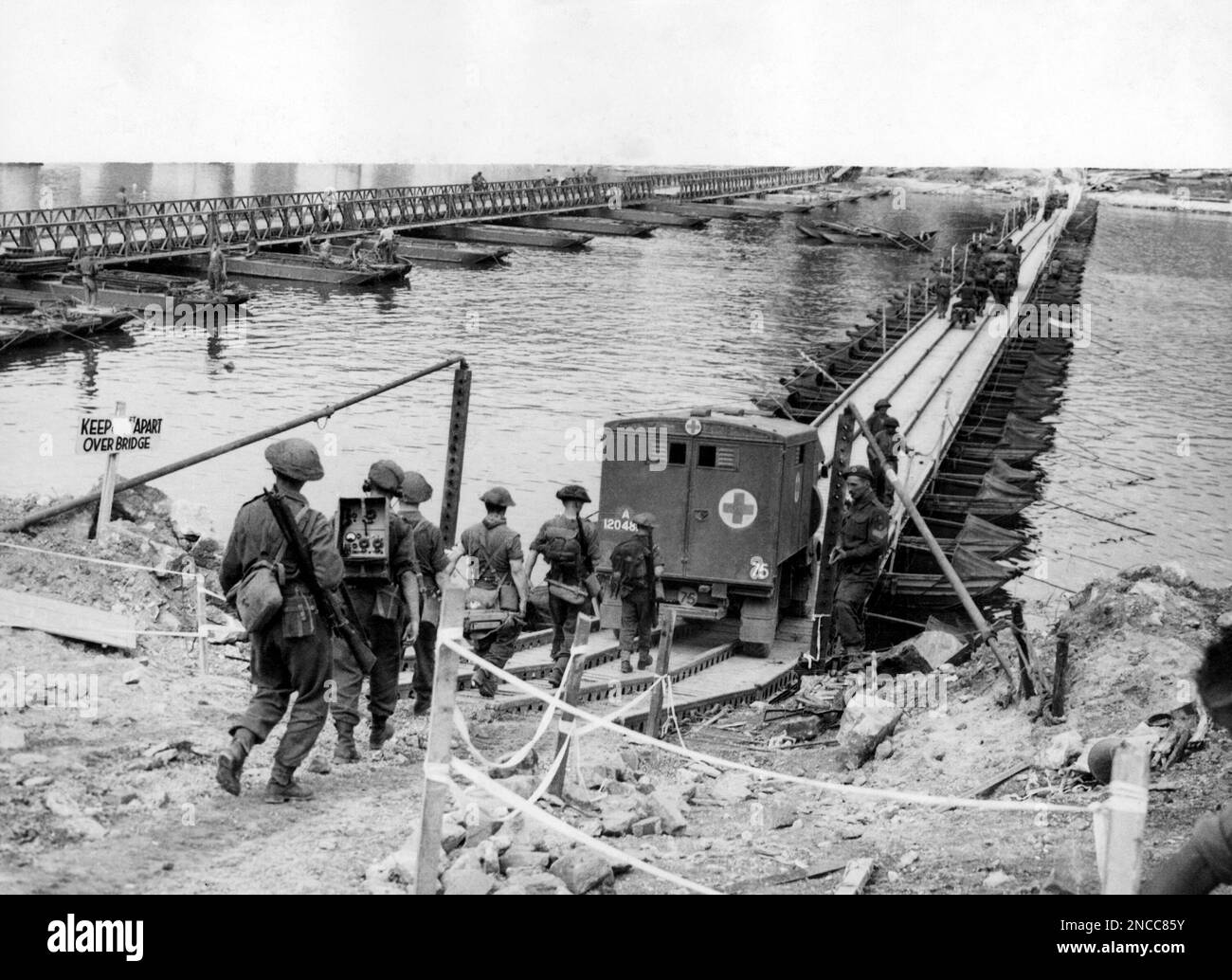 Bailey and Pontoon bridges have now been built across the River Seine ...