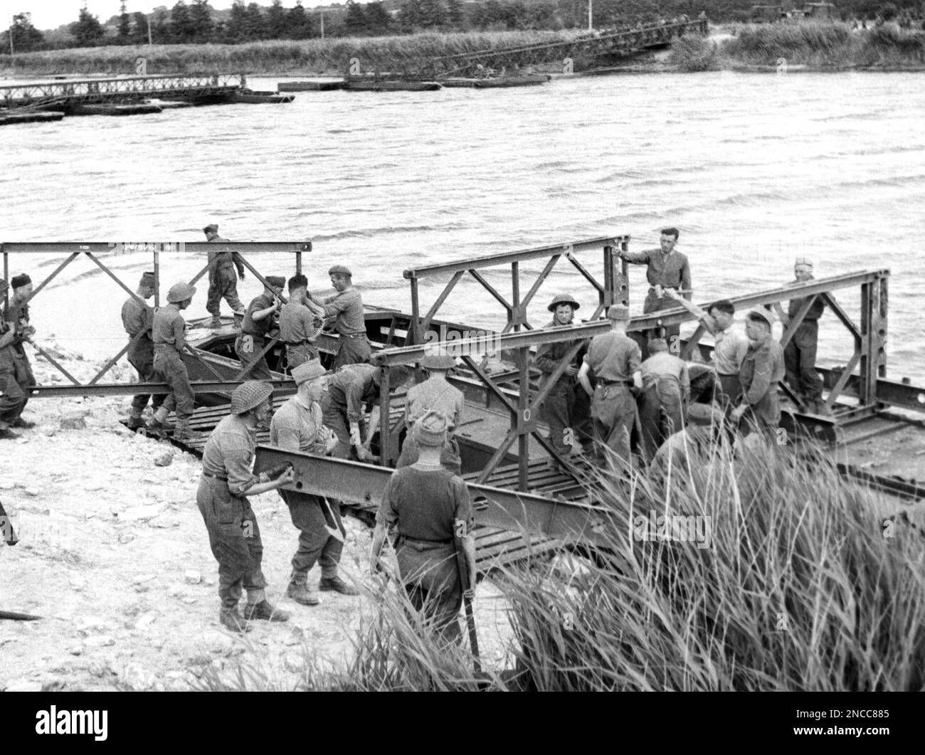 Royal engineers have constructed a Bailey bridge across the Caen canal ...