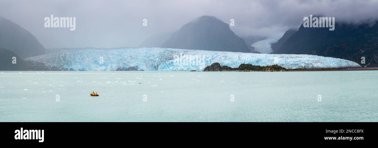 Panorama with crew in small power boat collecting iceberg by Amalia ...