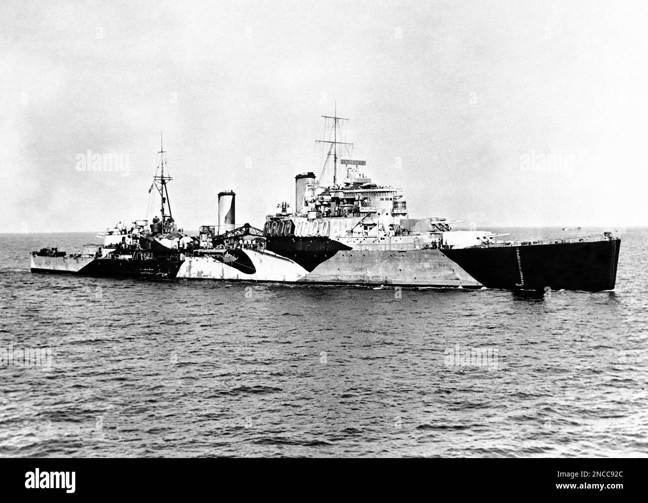 Britain's cruiser H.M.S. Mauritius going into bombard shore batteries ...