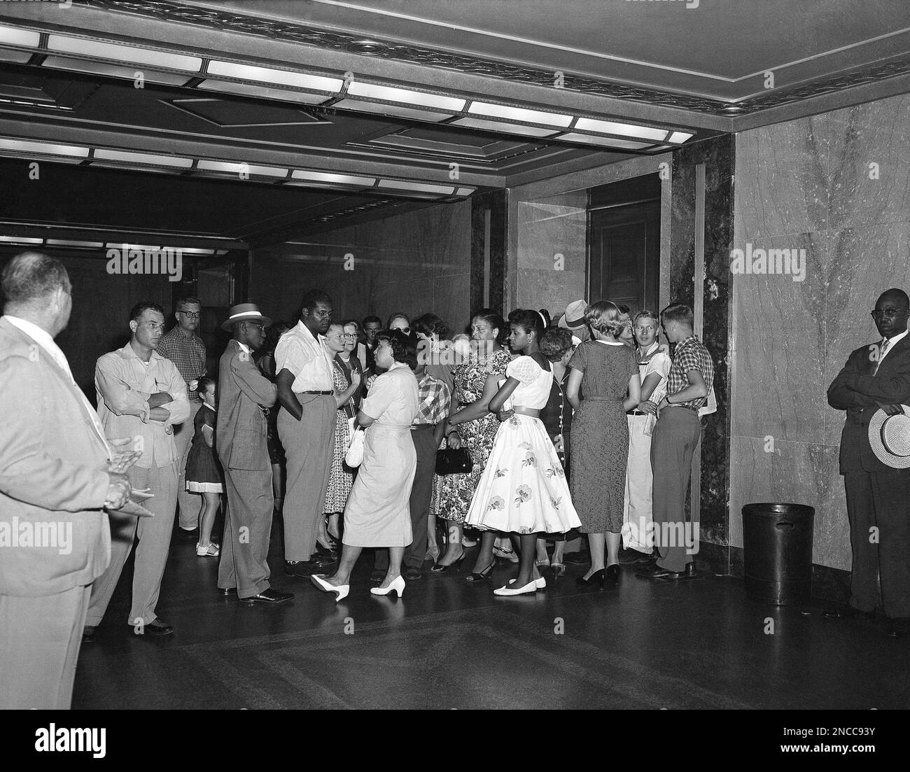 This was the scene outside the courtroom door in the hallway of the ...