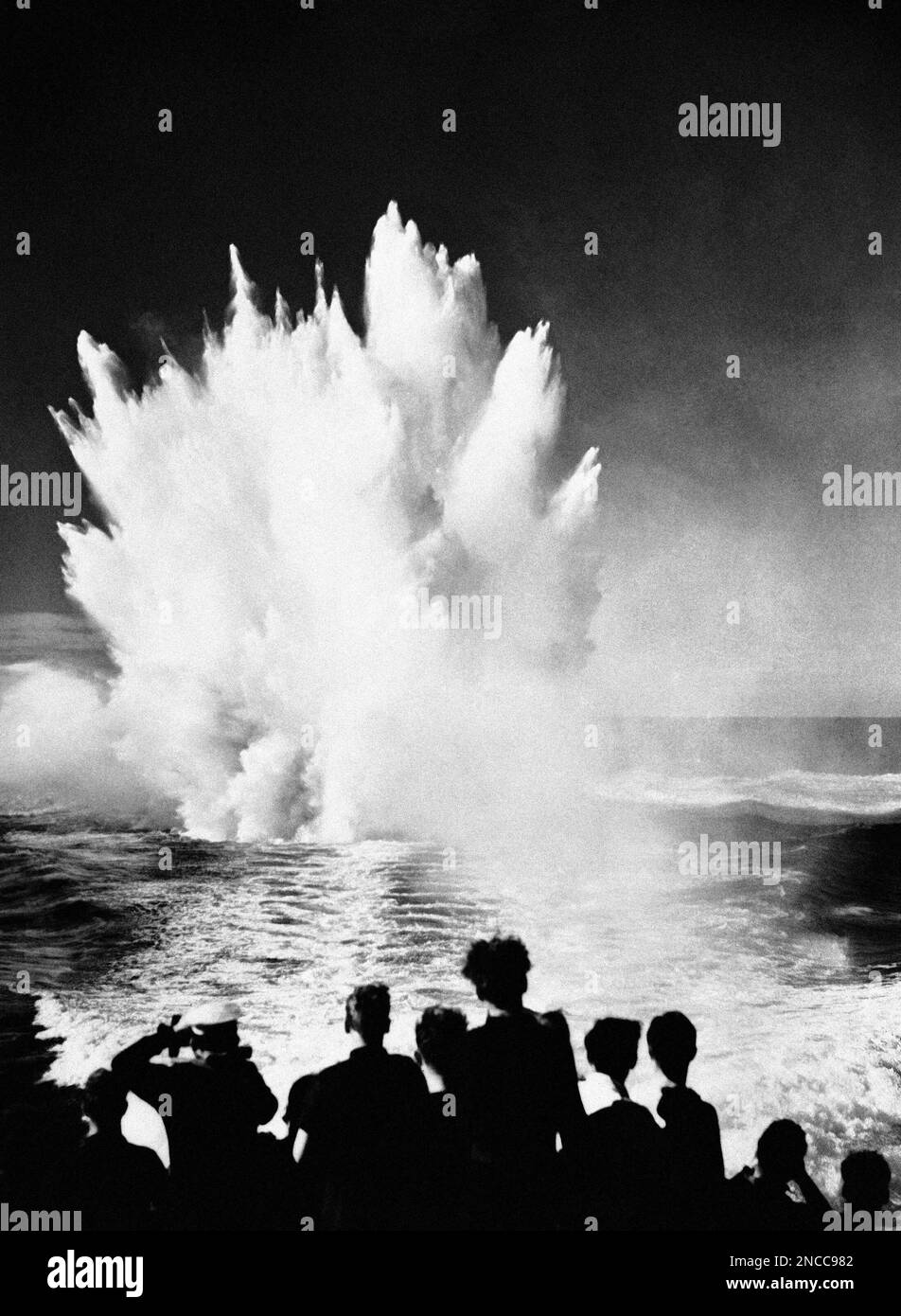 A depth charge exploding astern of a British destroyer during an attack ...