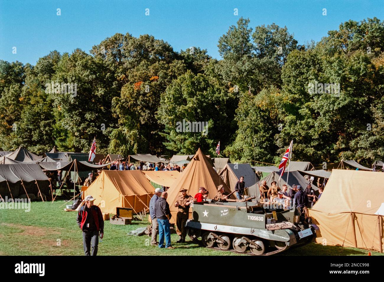 British WWII camp with a vintage tank and a large number tents and ...