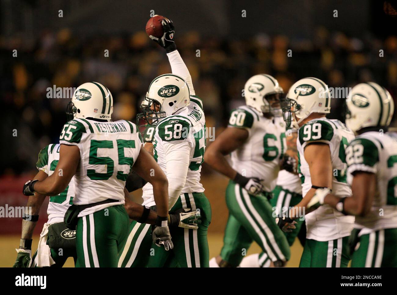 New York Jets linebacker Josh Mauga (58) celebrates during the first ...