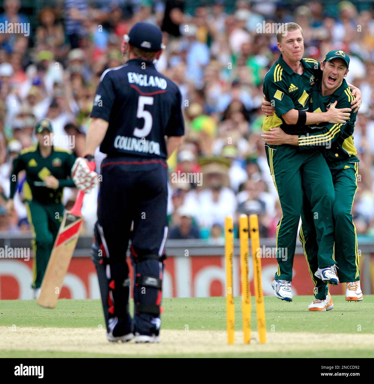 Australia's Xavier Doherty, center, celebrates with teammate David ...