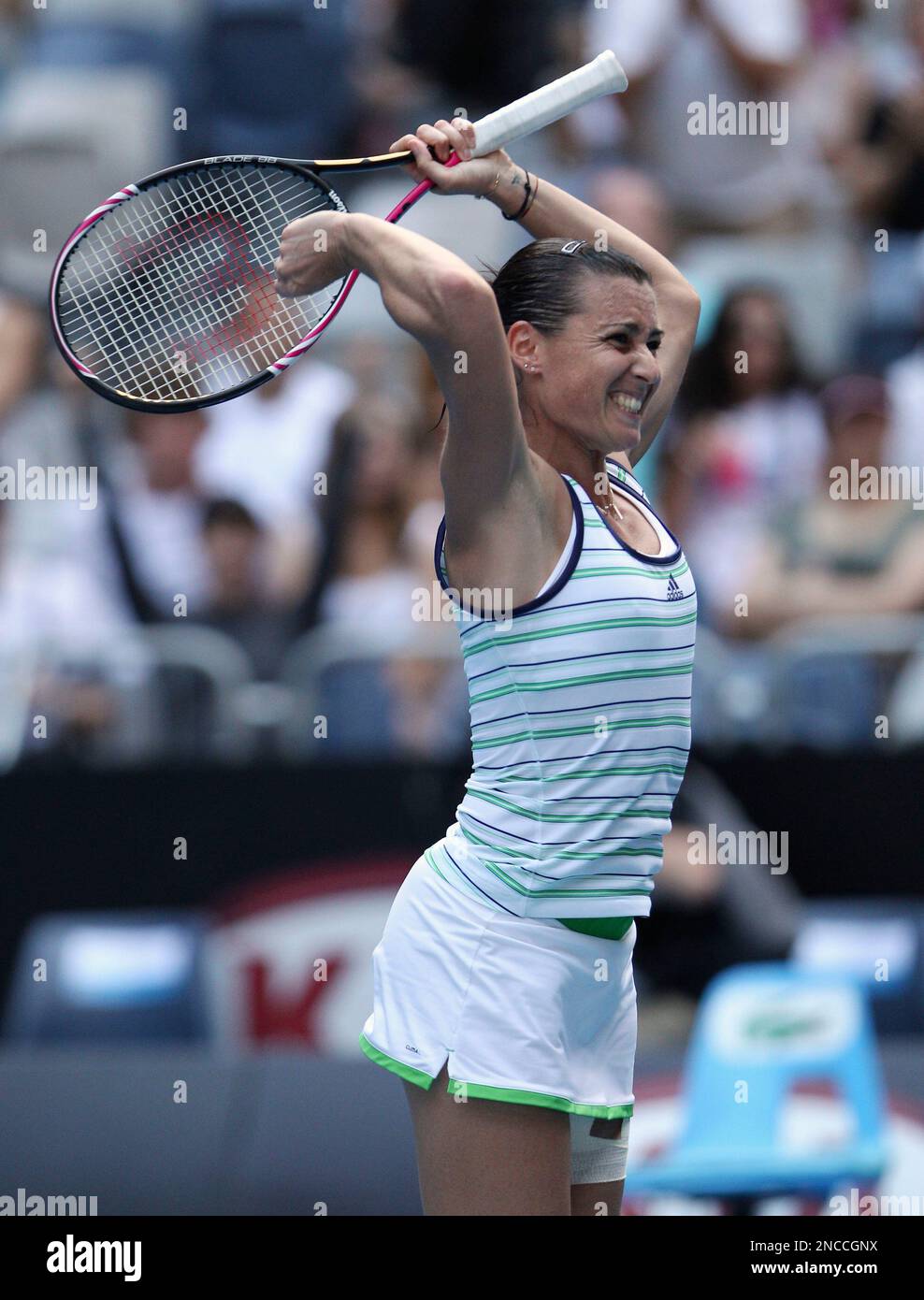 Italy's Flavia Pennetta celebrates after defeating Israel's Shahar Peer ...