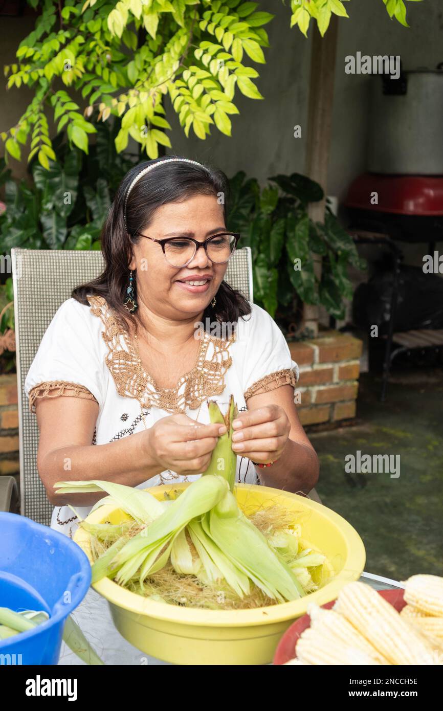 Older Woman cooking in the backyard Stock Photo - Alamy