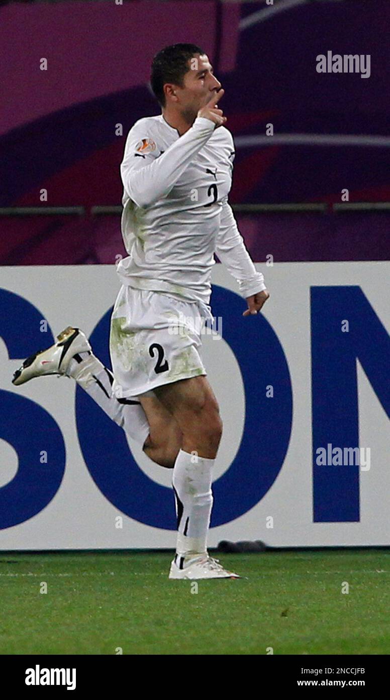 Uzbekistan's player Ulugbek Bakaev celebrates after scoring a goal ...