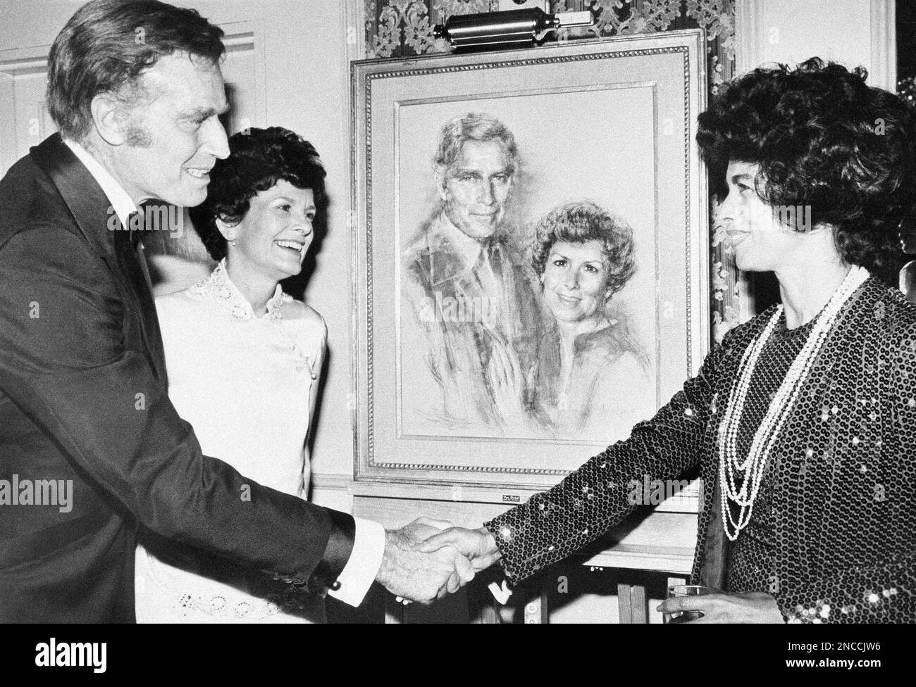 Actor Charlton Heston, left, and his wife, Lydia Clarke Heston, accept ...
