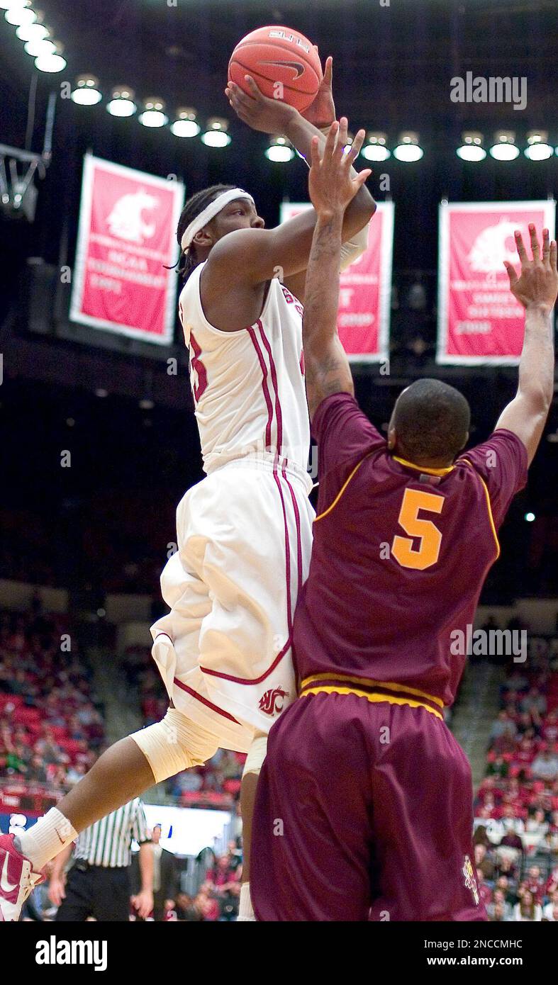 Washington State forward DeAngelo Casto, left, scores over Arizona ...
